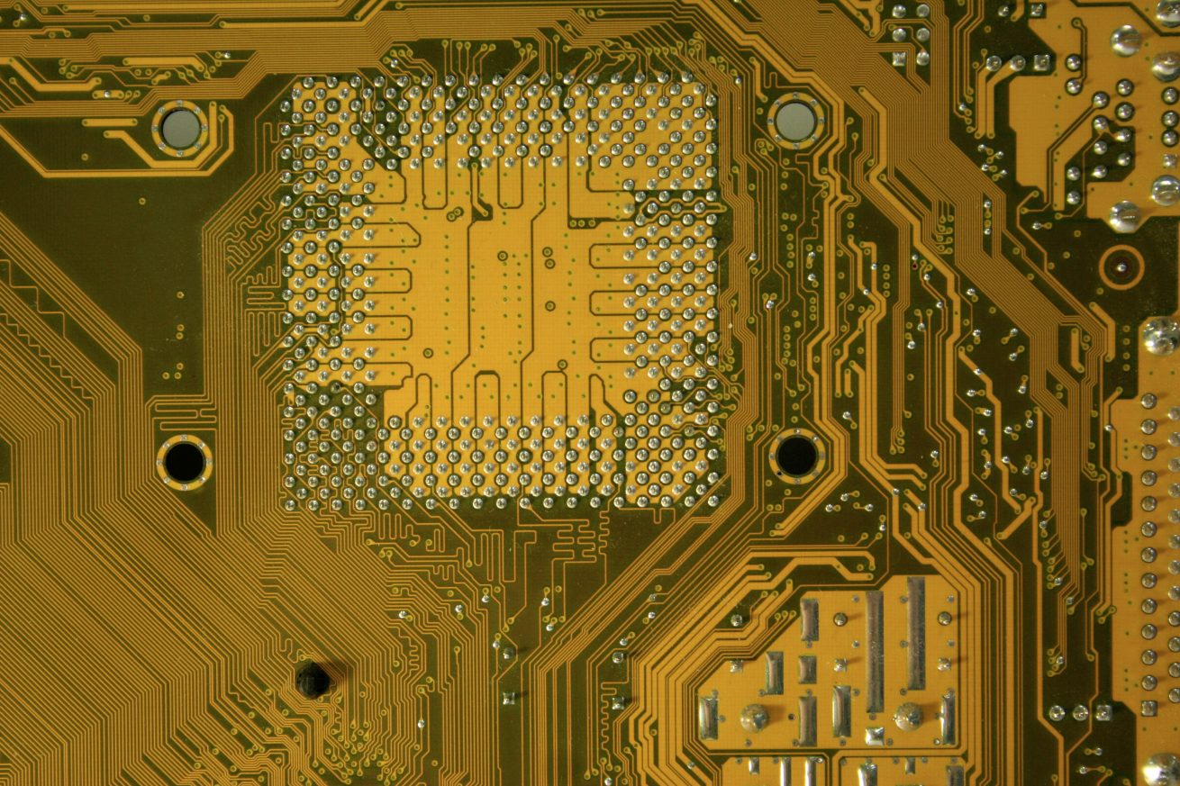 Computer texture yellow motherboard circuit stock photo - Texture X