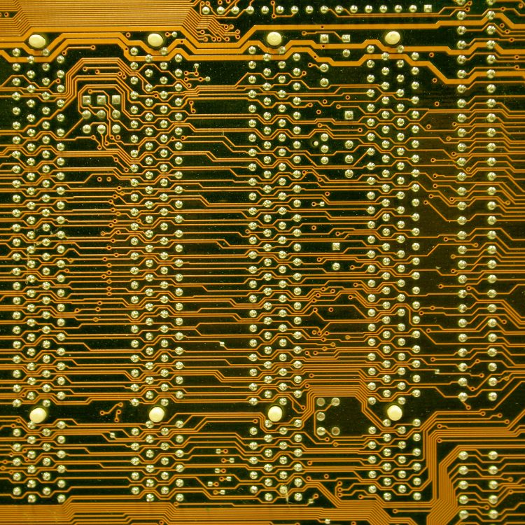 Computer texture yellow motherboard circuit stock photo - Texture X