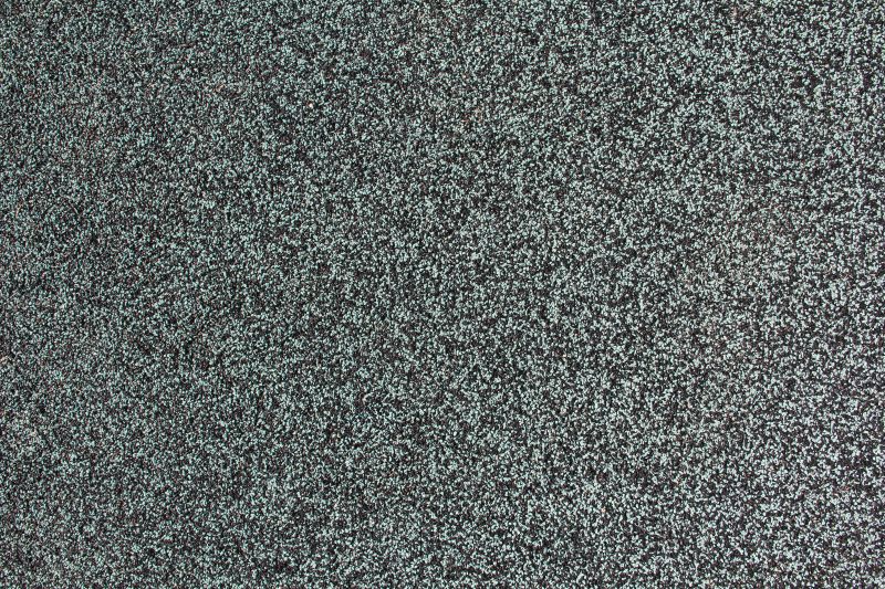 Ground texture rubber playground surface green black pieces plastic ...