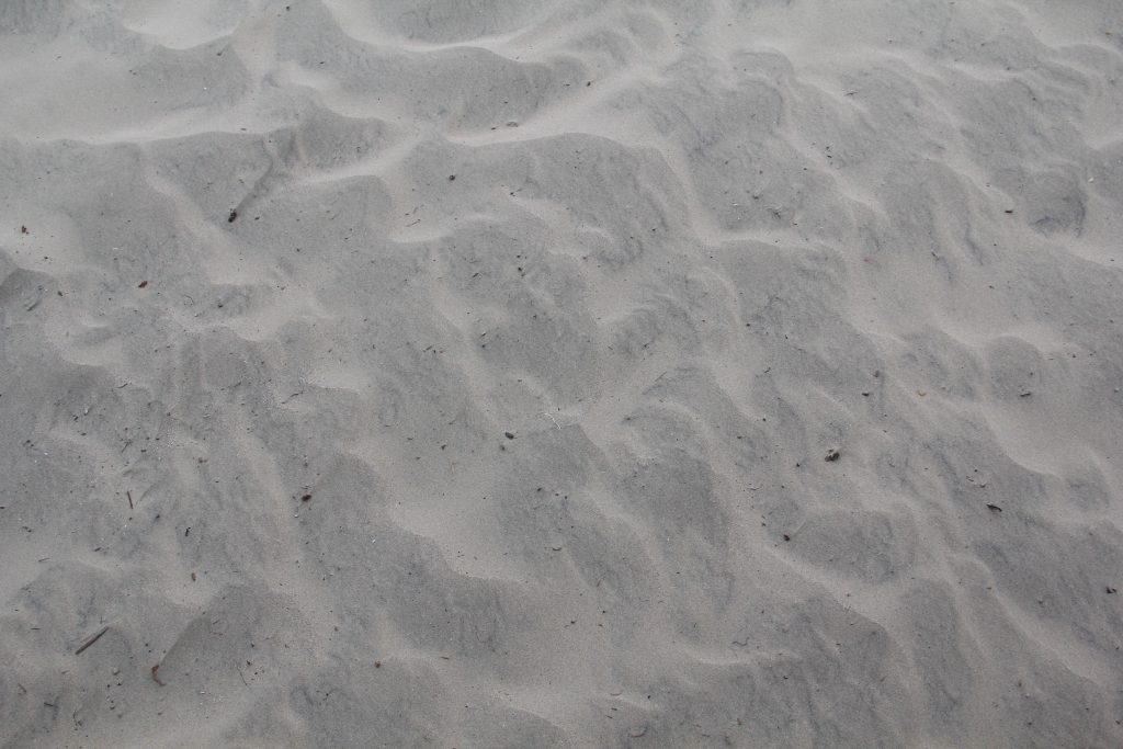 Sand ground texture grey light sandy beach stock photo - Texture X