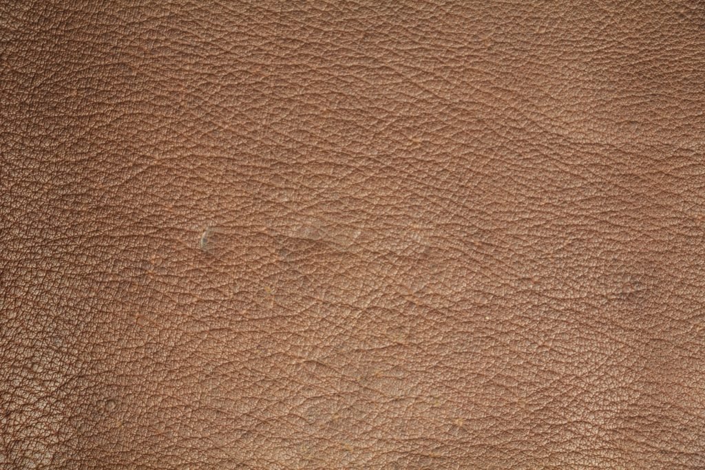 Dark Tan Textured Background