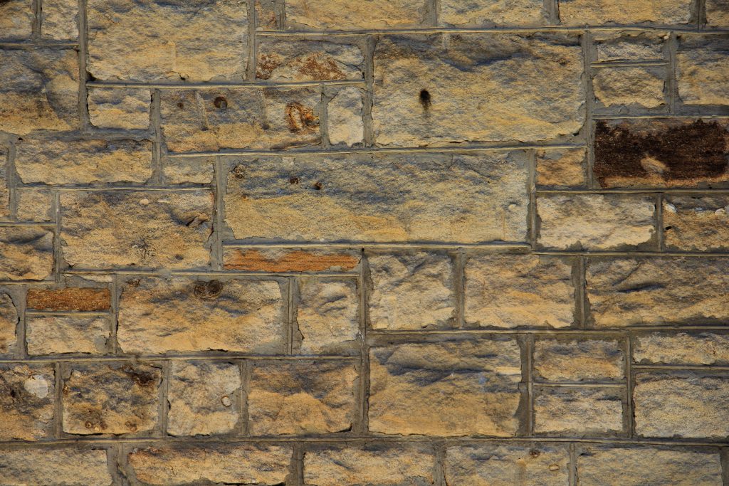 wall texture brick yellow block stone rough surface photo - Texture X