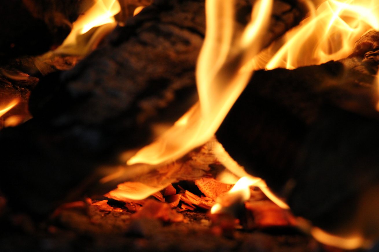 Fire wallpaper photo mid fire with two pieces of wood - Texture X