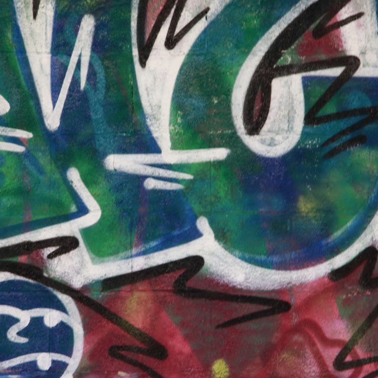 White And Blue Spray Paint Graffiti On Wall - Texture X