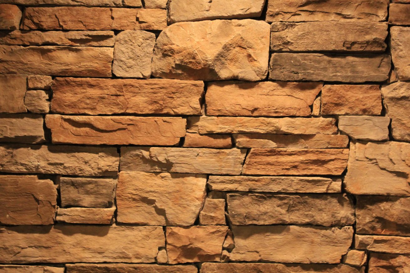 Stone accent tile formation exterior luxury home - Texture X